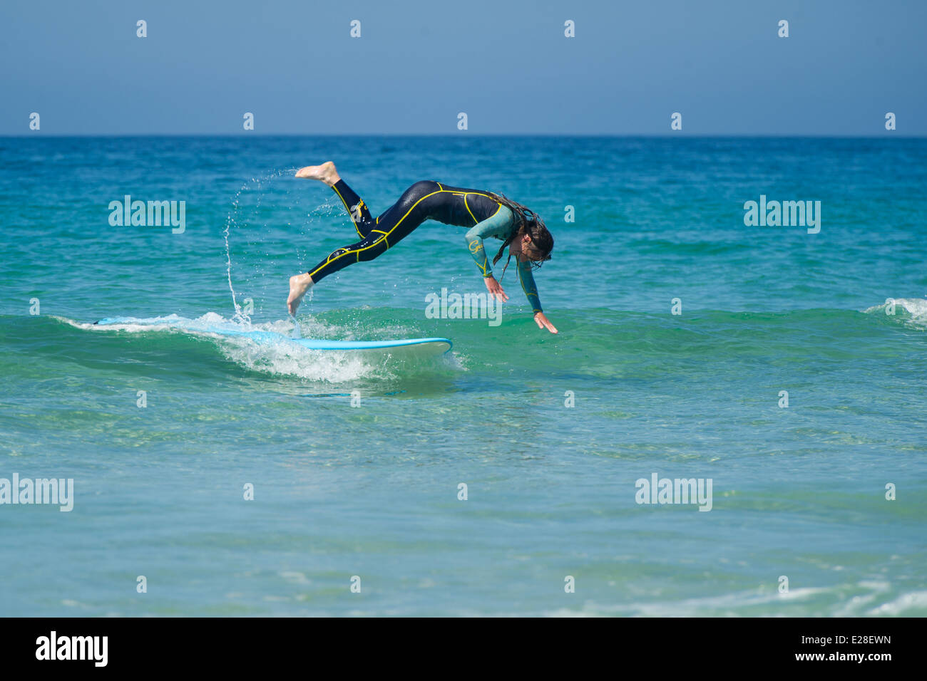 Falling off surfboard hi-res stock photography and images - Alamy
