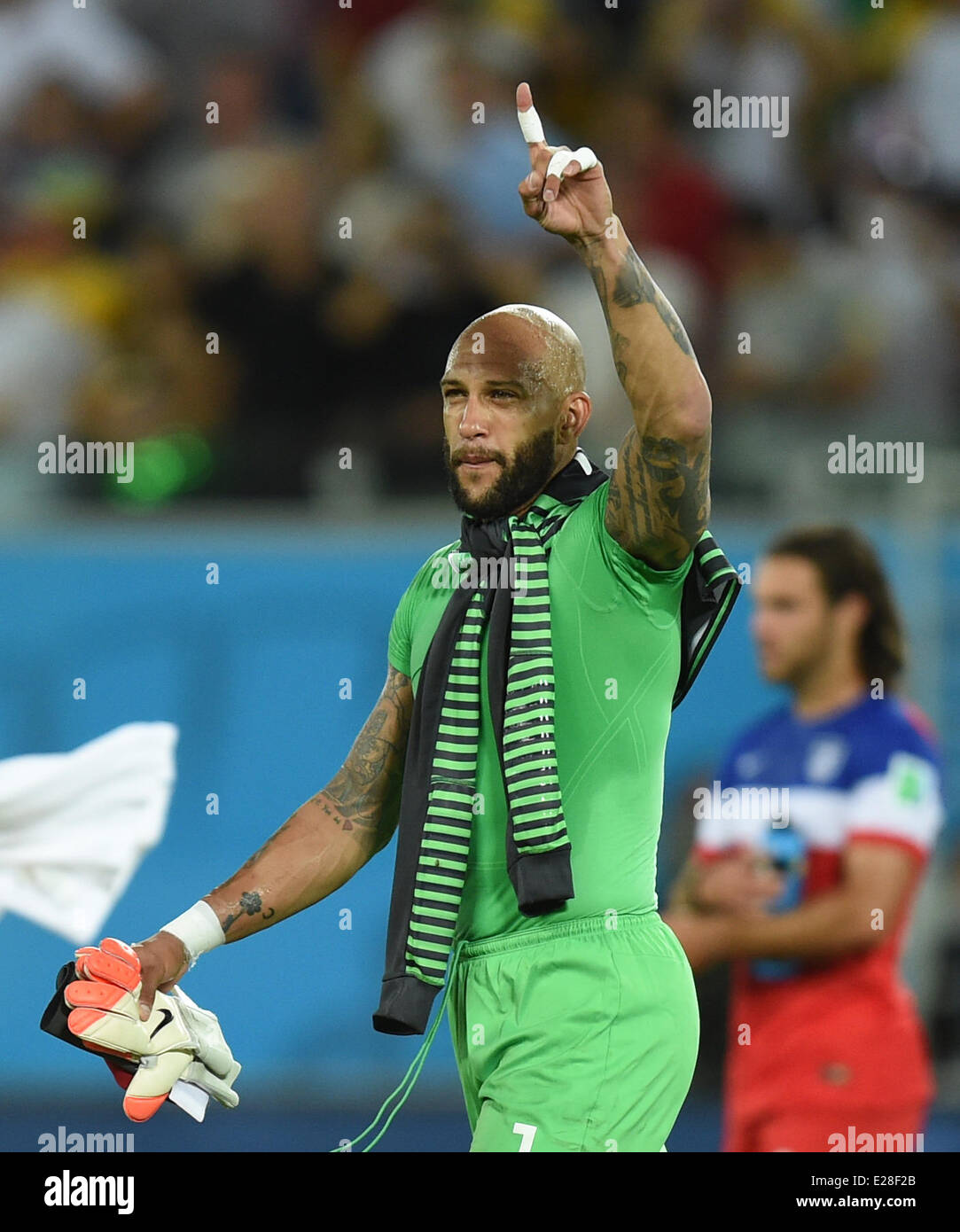 Natal, Brazil. 16th June, 2014. Goalkeeper Tim Howard of USA reacts ...