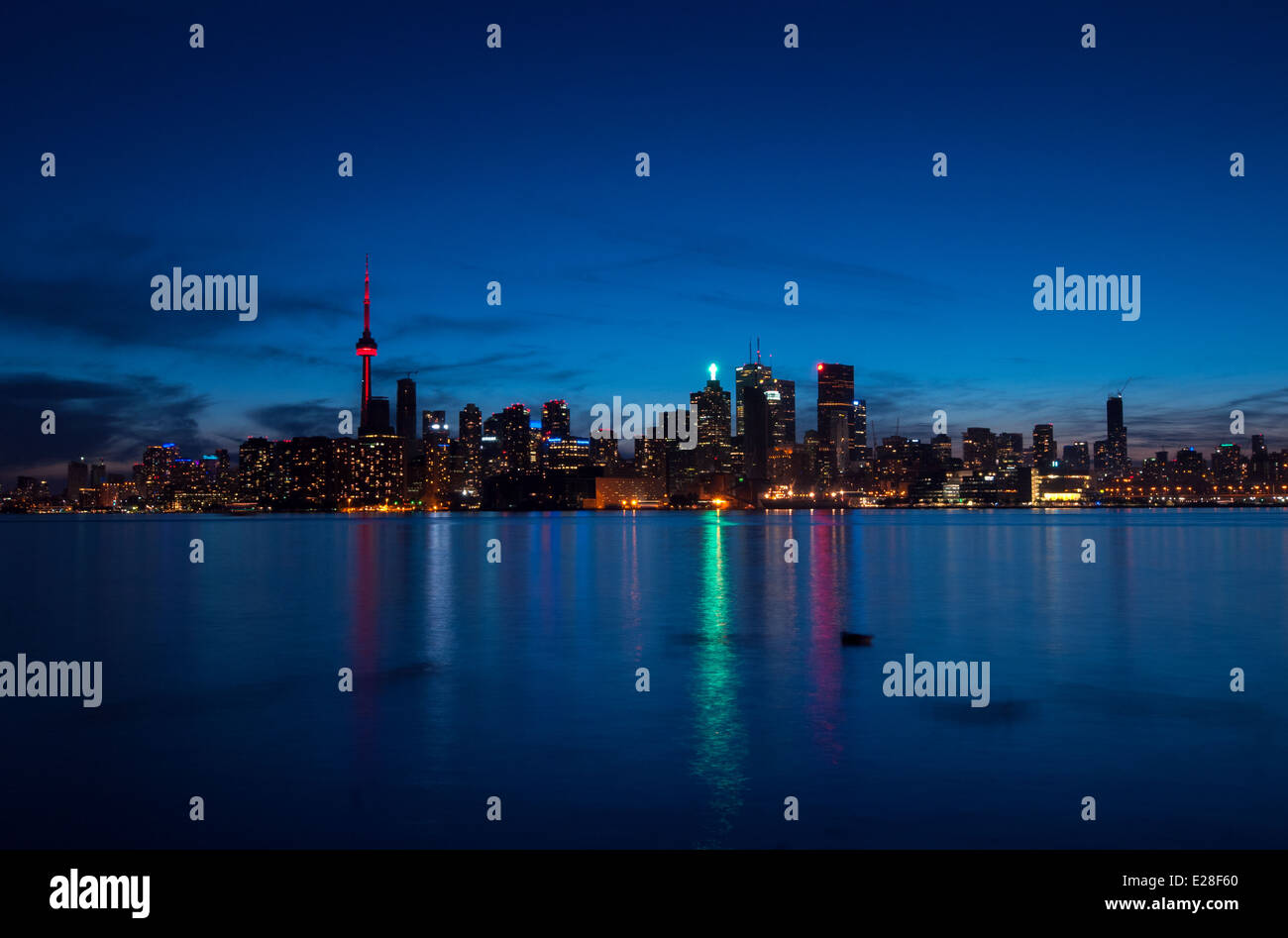 Toronto cityscape at night with reflections over the lake Stock Photo ...