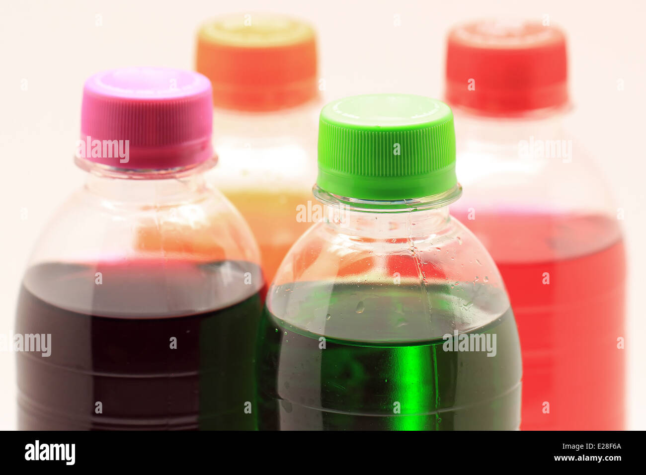 colorful of soft drink bottles isolated on white background Stock Photo ...