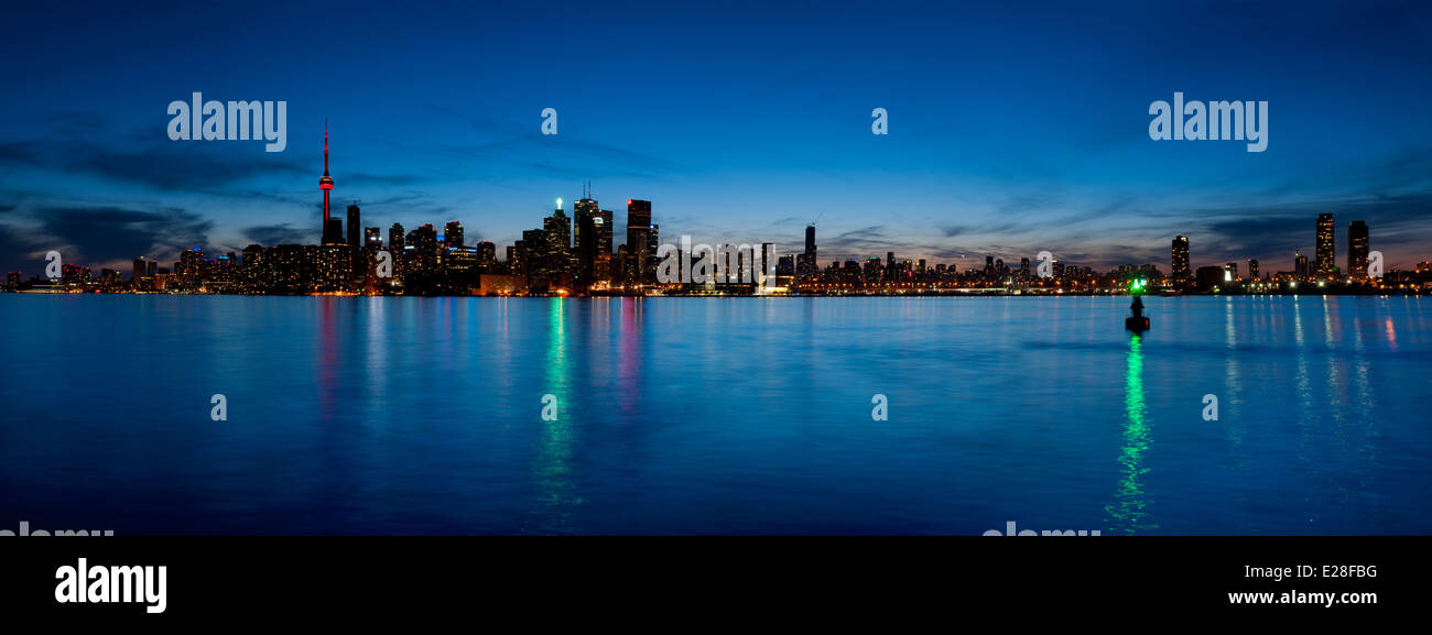 Toronto skyline panorama at dusk over lake with colorful lights Stock ...