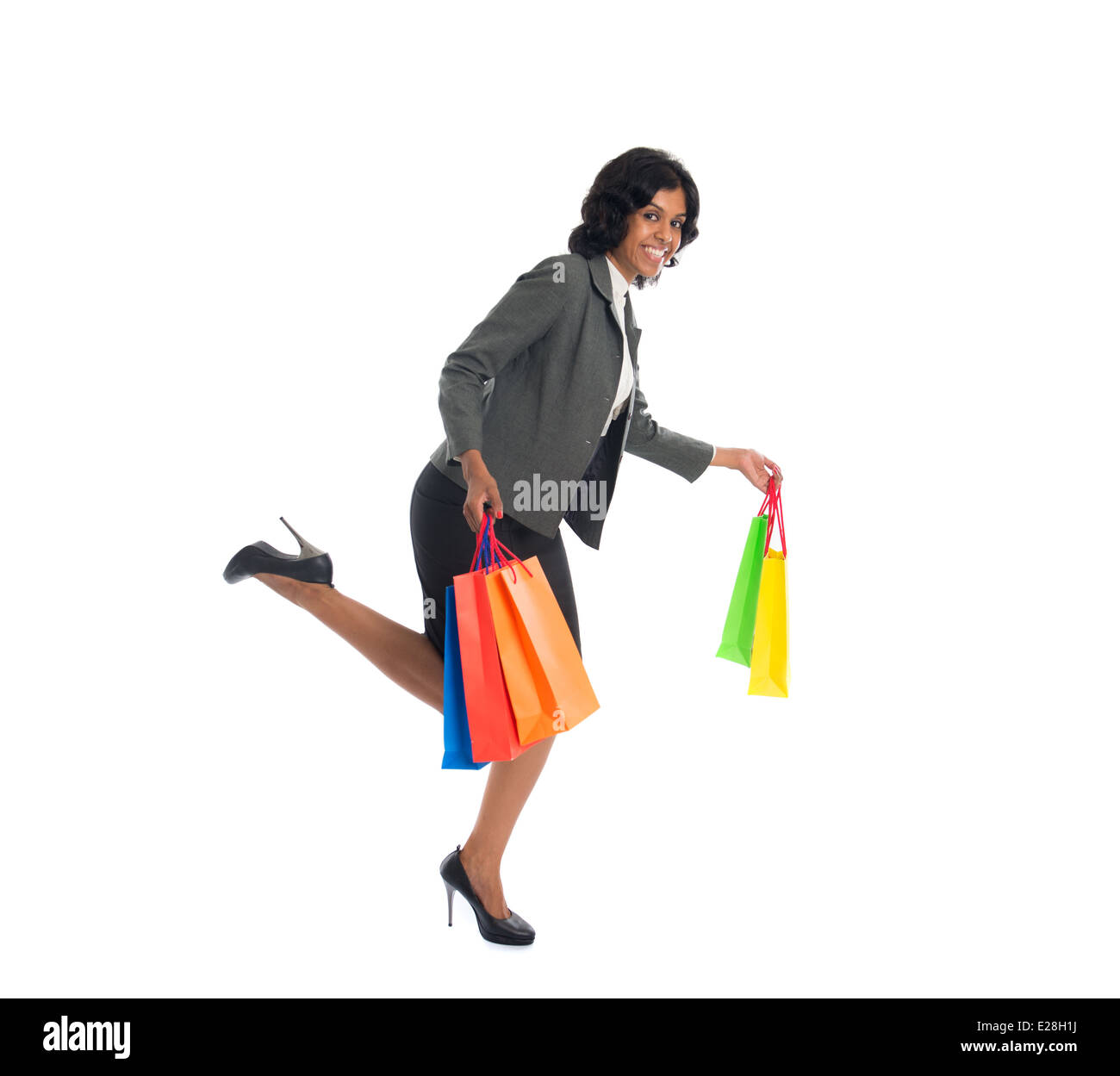 indian business woman running while shopping Stock Photo - Alamy