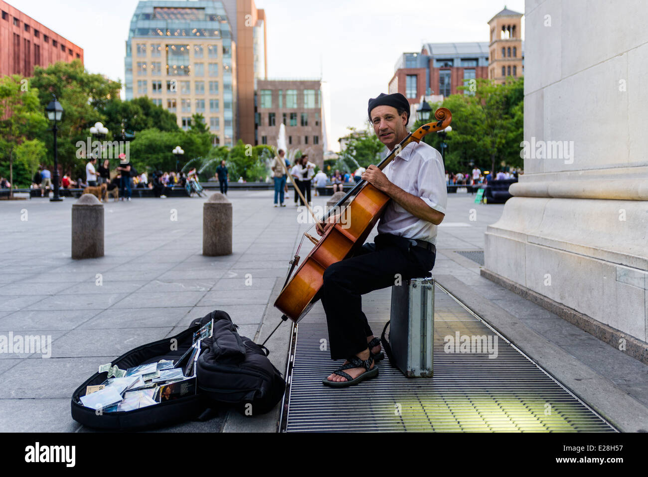 New York, NY 17 June 2014 Cellist Peter Lewy playing under the arch in ...