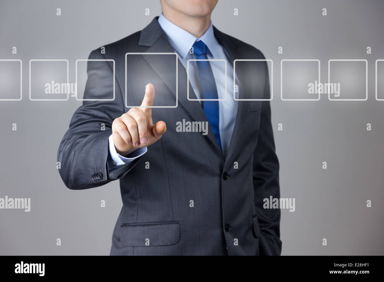 Business Man pushing on a touch screen interface Stock Photo - Alamy