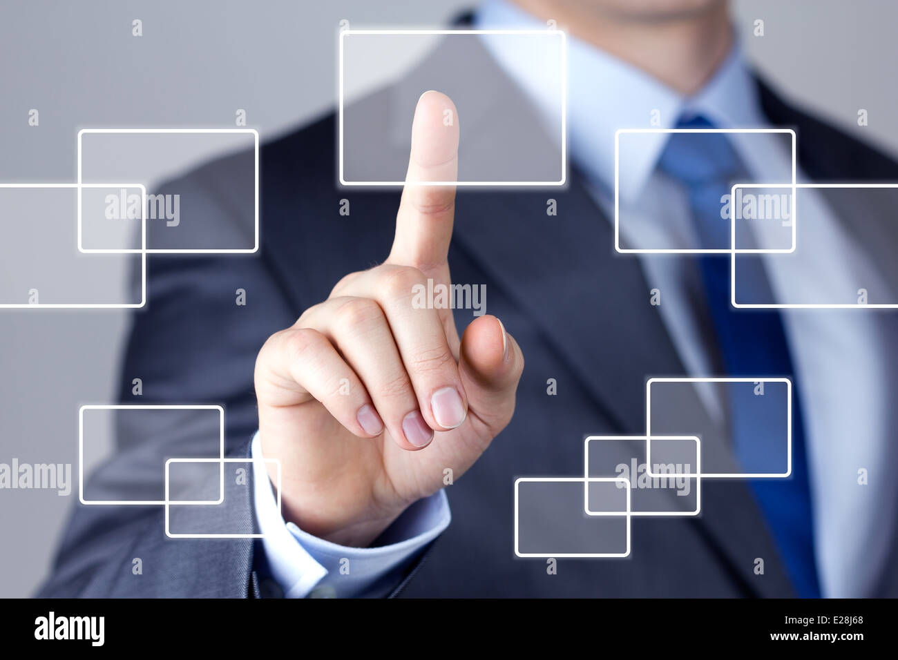 Business Man pushing on a touch screen interface Stock Photo - Alamy