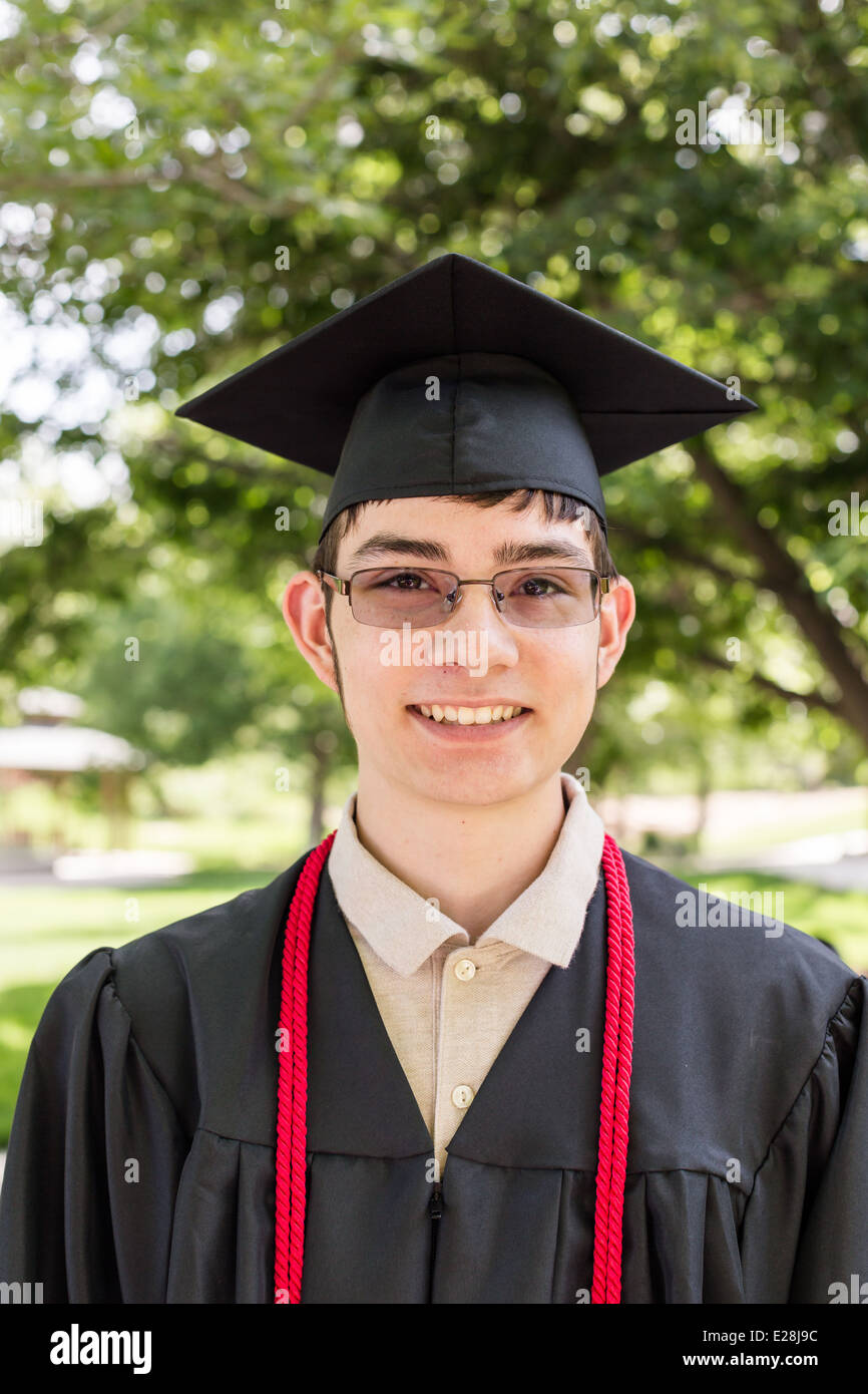 Highschool graduate after graduation caremony in the park Stock Photo ...