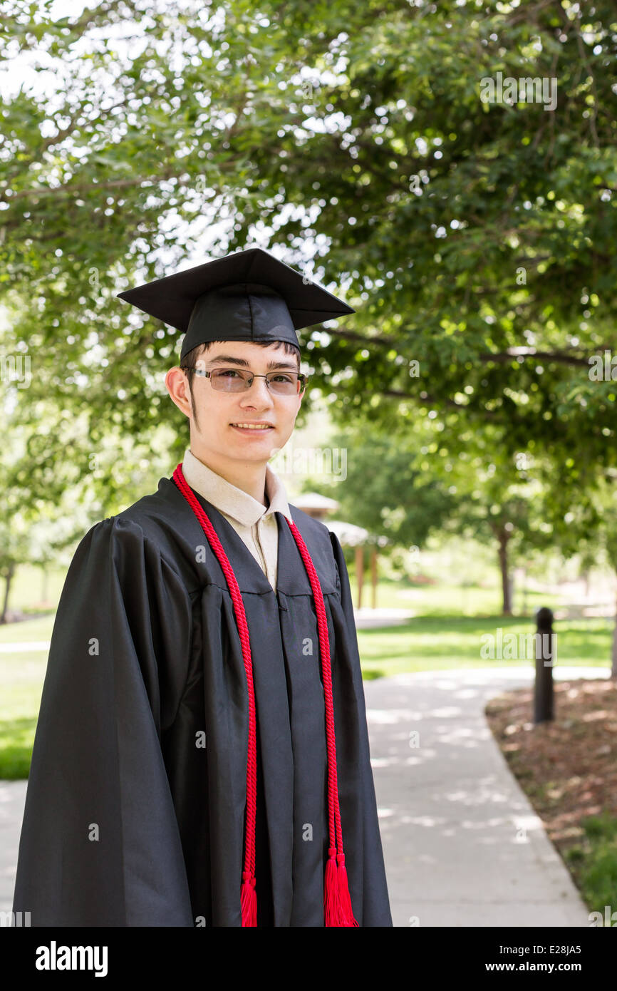 Highschool graduate after graduation caremony in the park Stock Photo ...