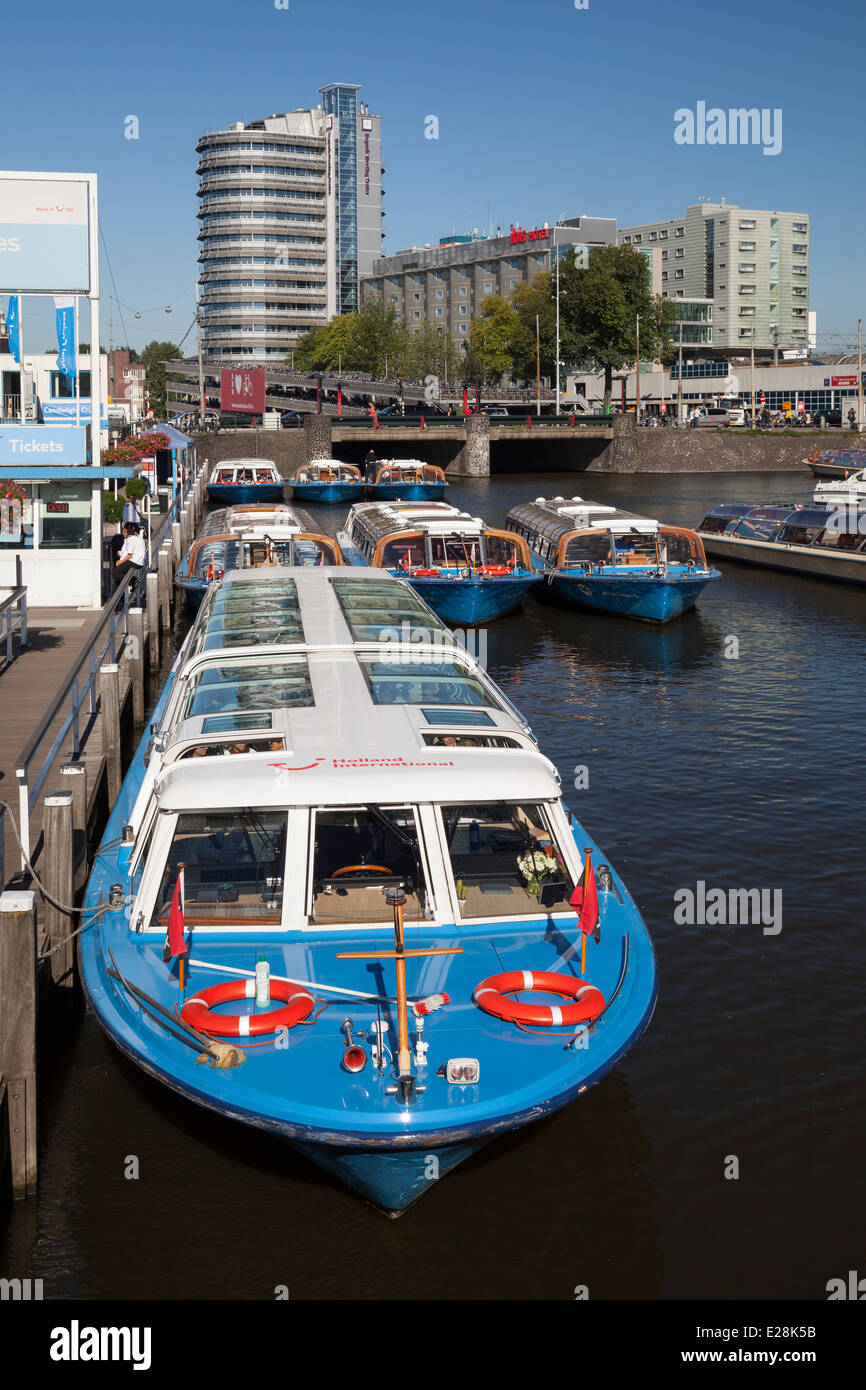 Pier, boats for canal cruises, Amsterdam, North Holland province ...