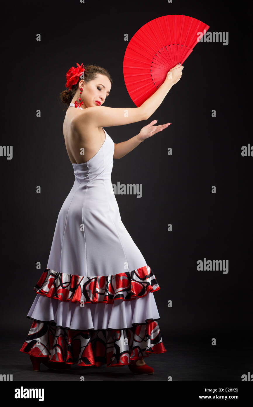Flamenco dancer in white dress with big red fan Stock Photo - Alamy