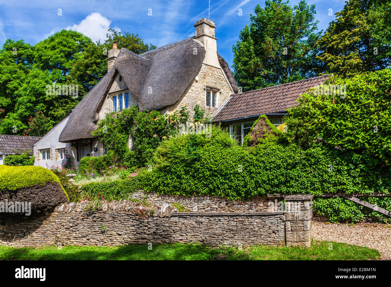 The picturesque thatched cottage in the Cotswold village of Castle ...