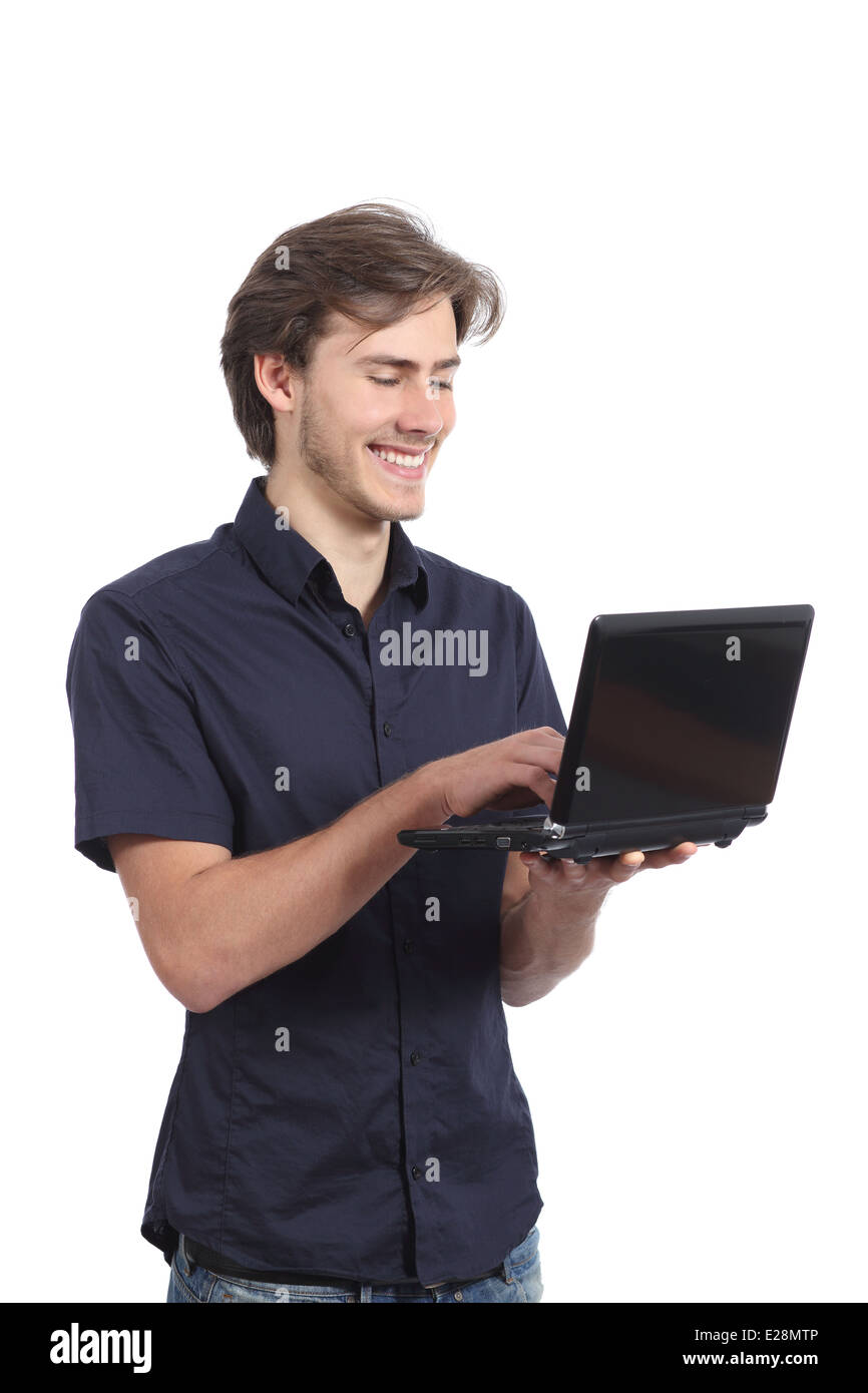 Man smiling browsing internet on the laptop isolated on a white ...