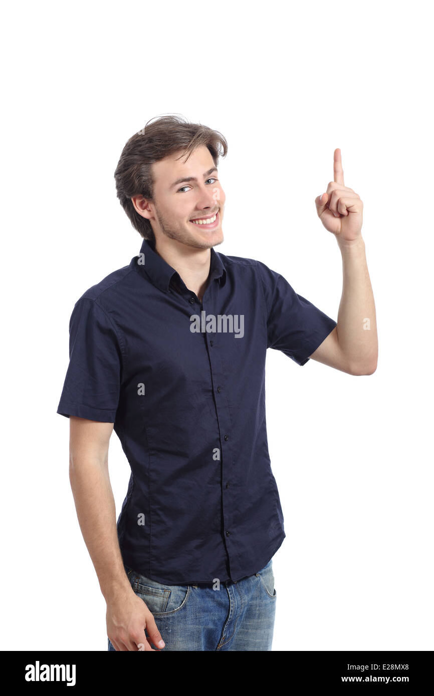 Happy presenter man pointing up and looking at camera isolated on a ...