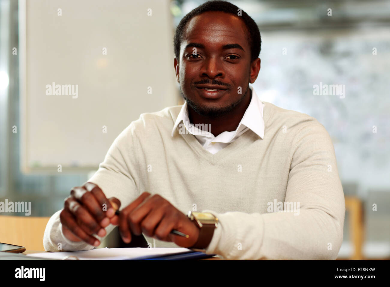 Happy man working table hi-res stock photography and images - Alamy