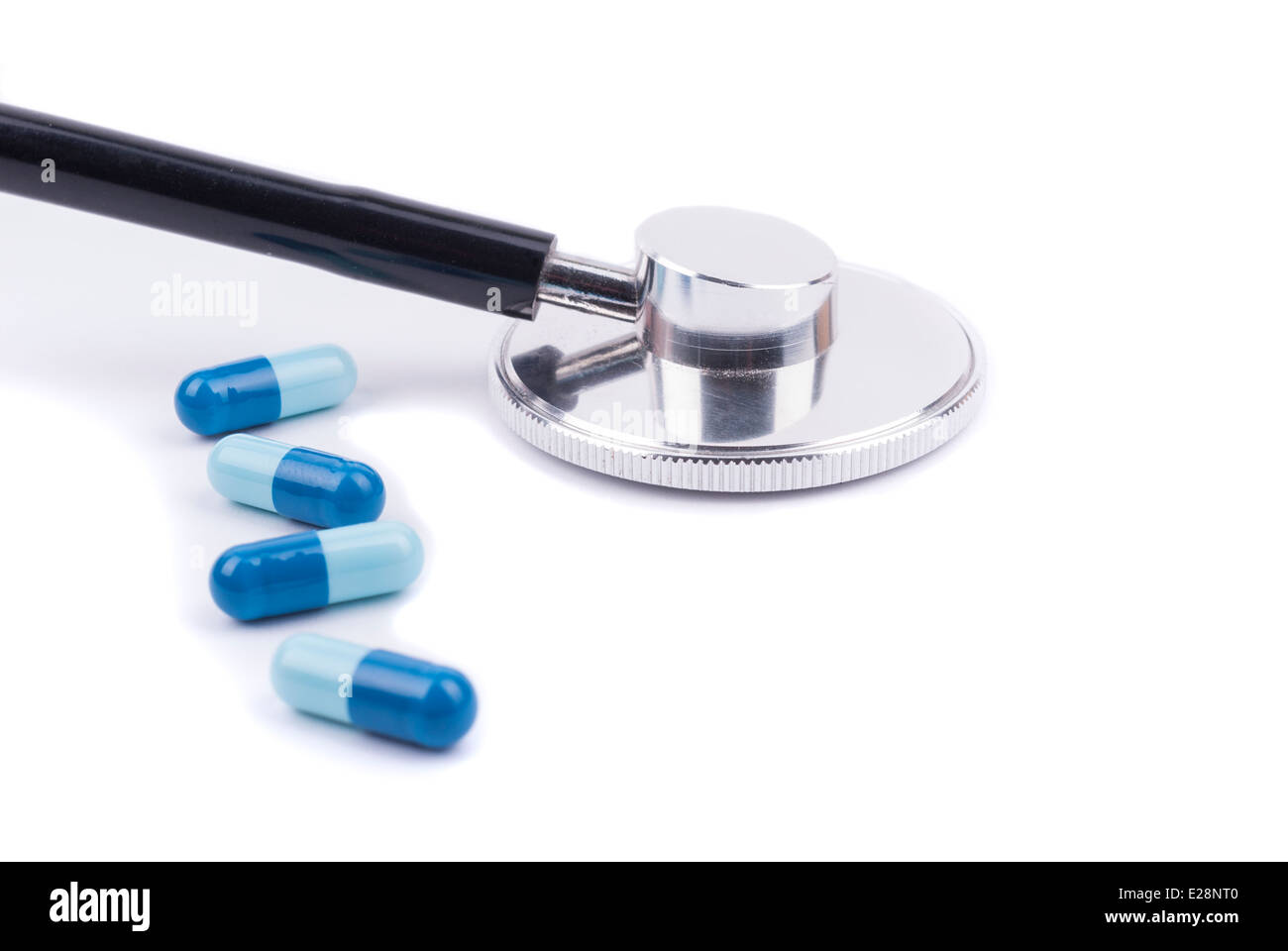 Stethoscope and pills Stock Photo - Alamy
