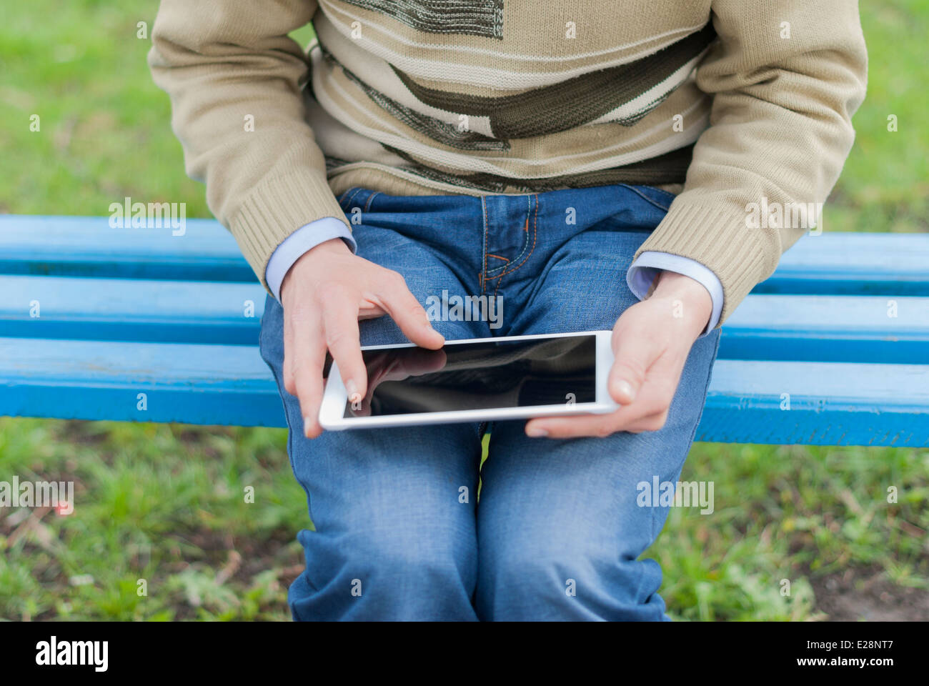 Man with tablet computer in hands Stock Photo - Alamy