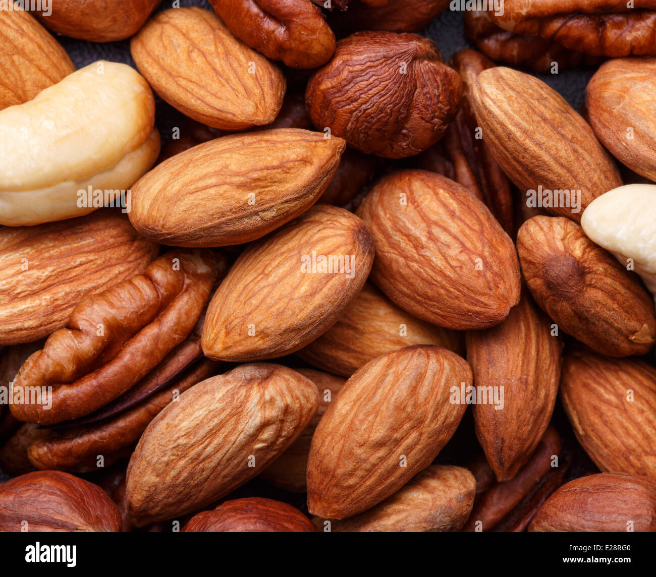 Background texture of assorted mixed nuts including cashew nuts, pecan ...