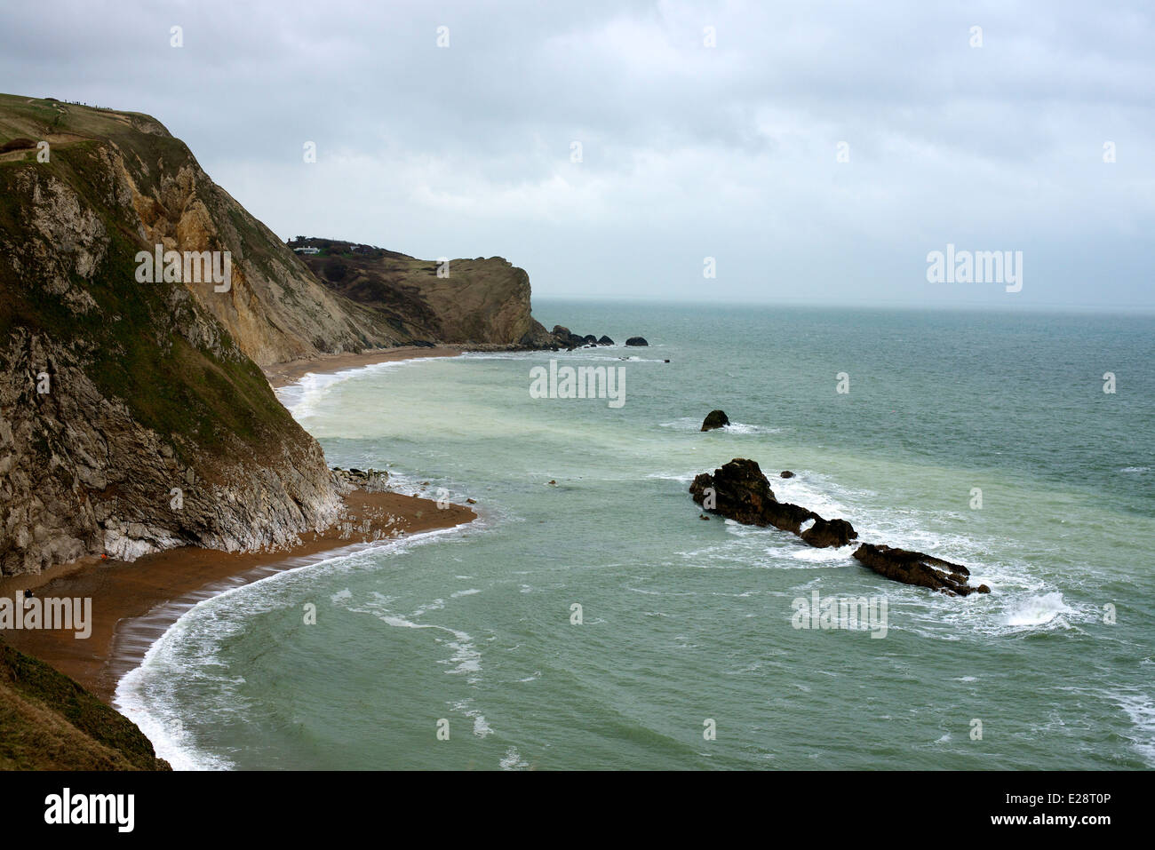 The Dorset Crumple, the Portland Stone "Man of War" stack at Lulworth ...