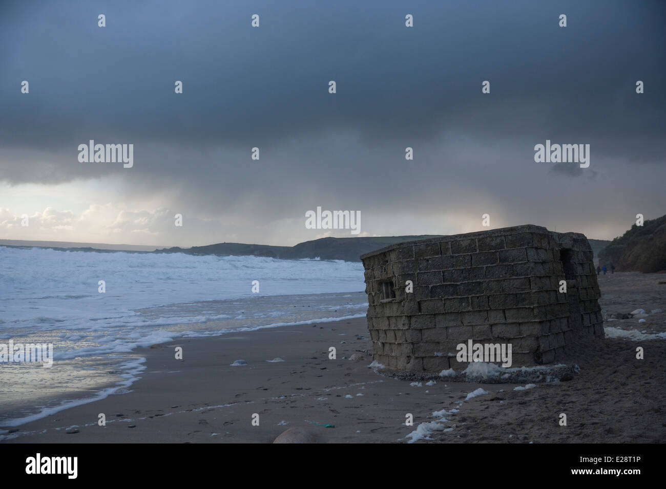 A world war 2 pill box is left sitting on the beach due to coastal ...