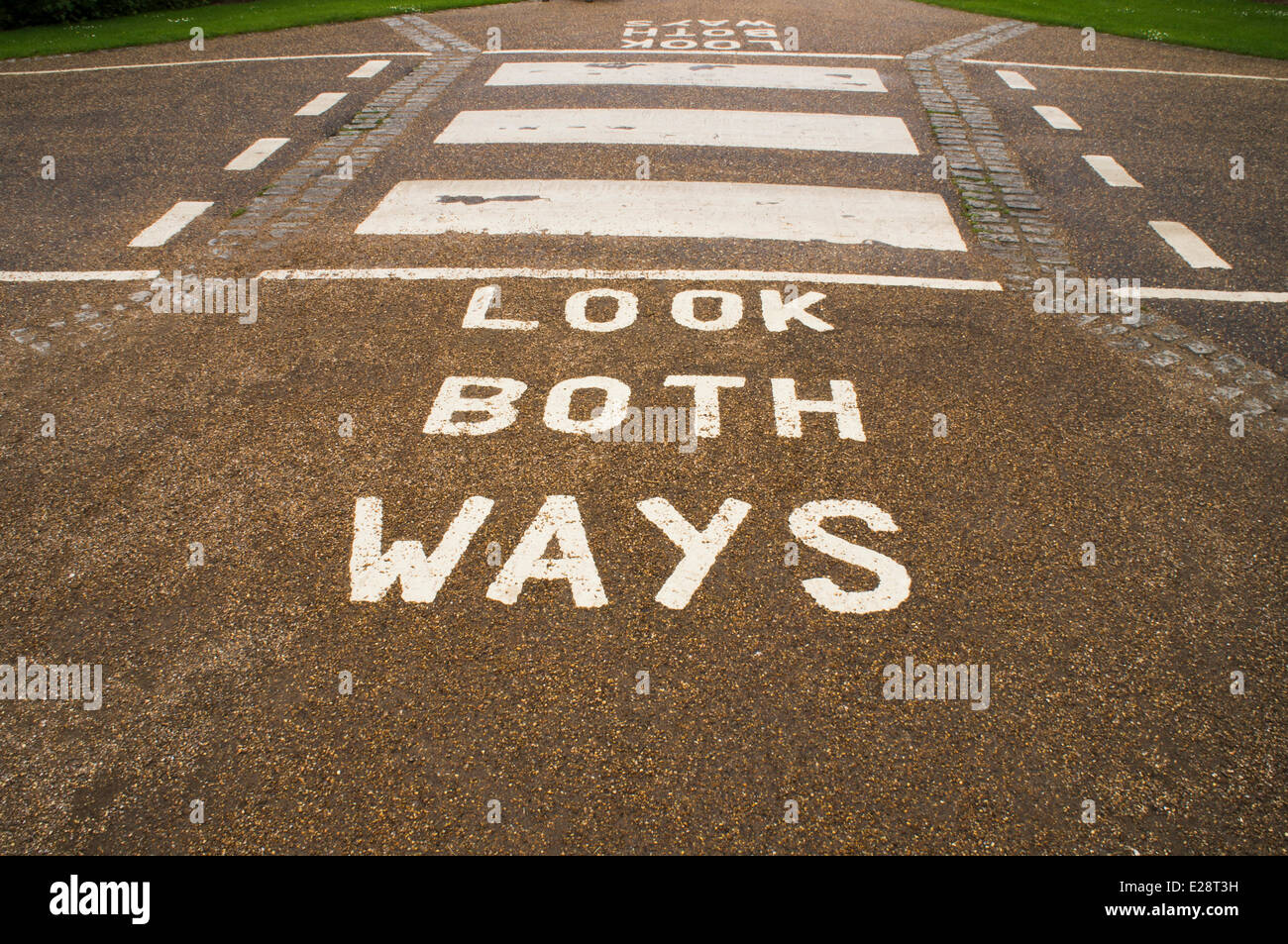 pedestrian crossing zebra, writing, notice LOOK BOTH WAYS, at Wakehurst ...