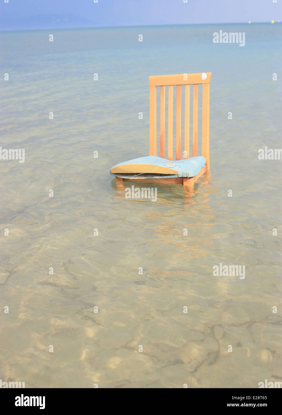 Chair in the water Stock Photo - Alamy