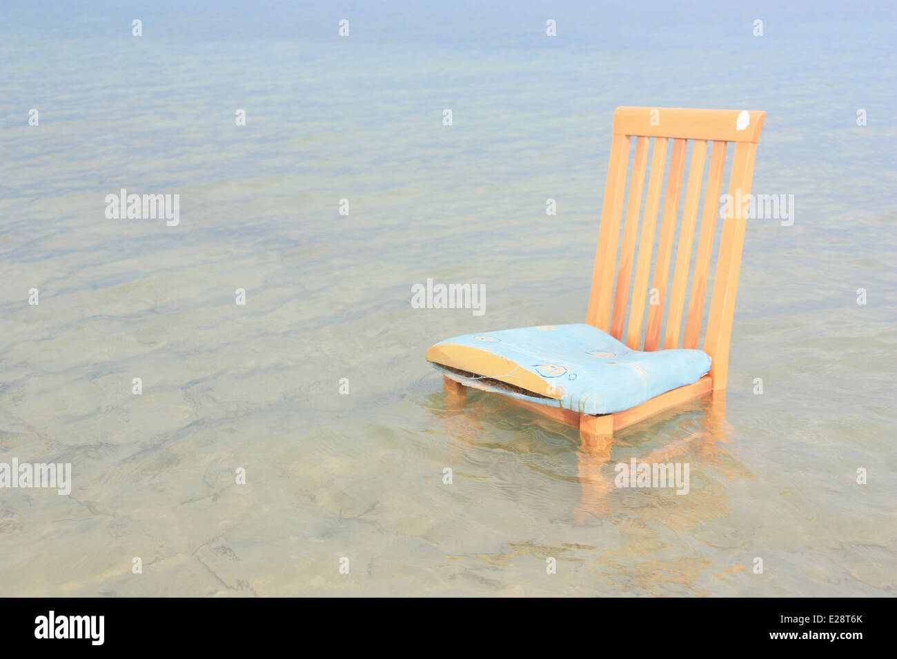 Chair in the sea Stock Photo - Alamy