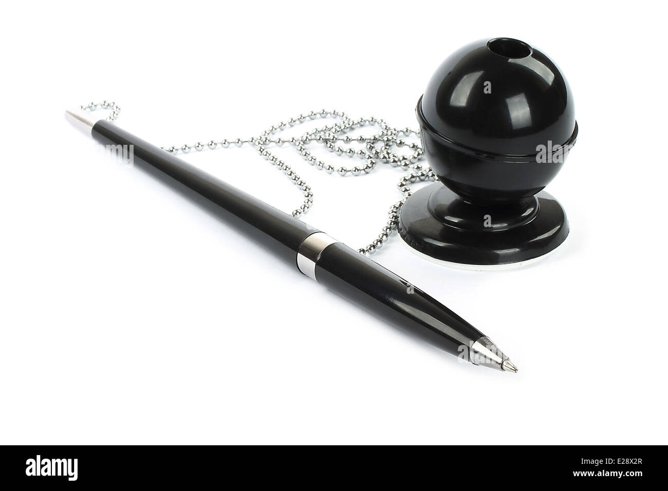 Black ballpoint pen with chain and stand on white background Stock ...