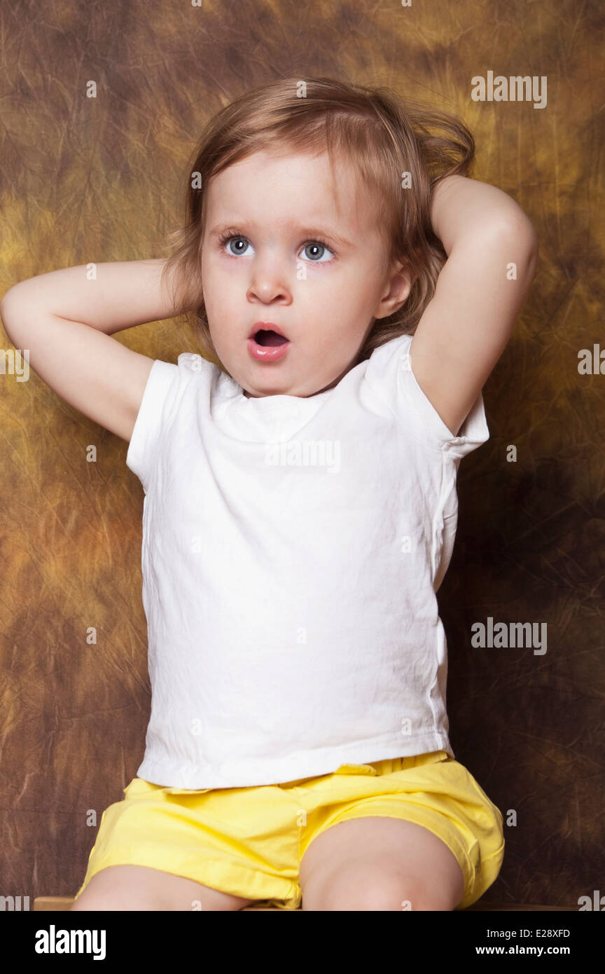 Portrait yawning baby girl hi-res stock photography and images - Alamy
