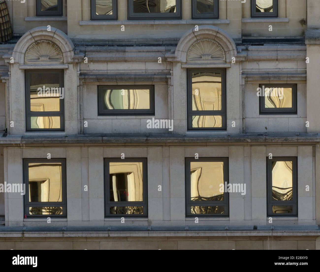 A block of eight windows in Paris with unusual reflections Stock Photo ...