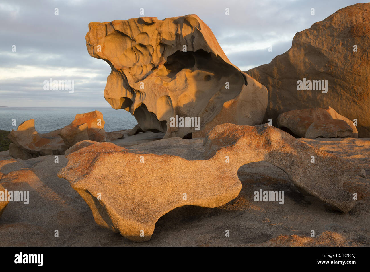 Eroded coastal rocks on granite outcrop at sunset, Remarkable Rocks ...