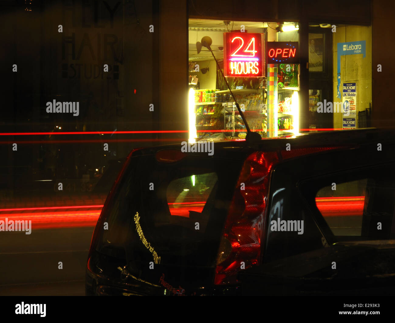 24hr convenience store neon open sign nighttime Stock Photo - Alamy