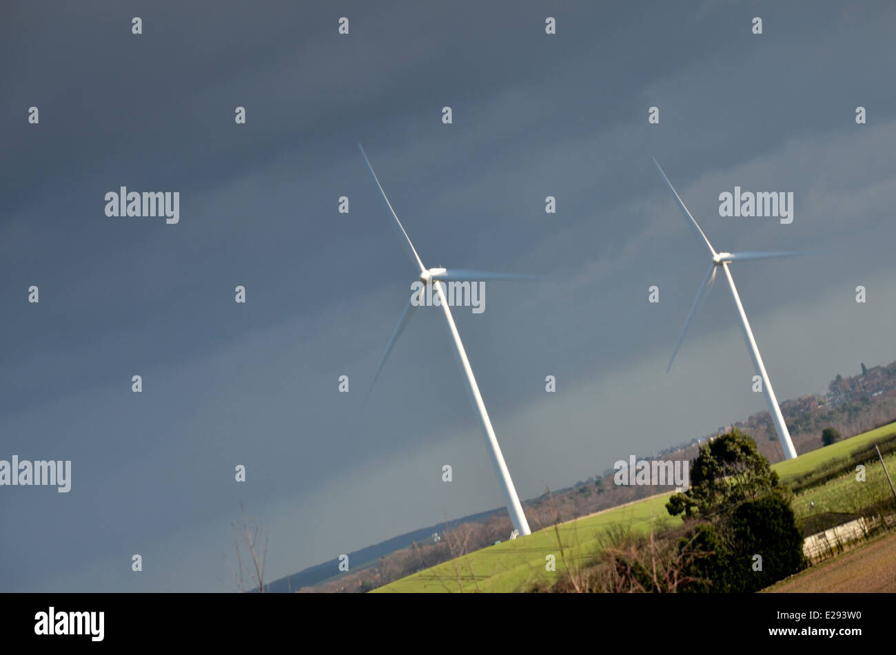 Wind Turbines against dark grey clouds, Rainworth Nottinghamshire Stock ...