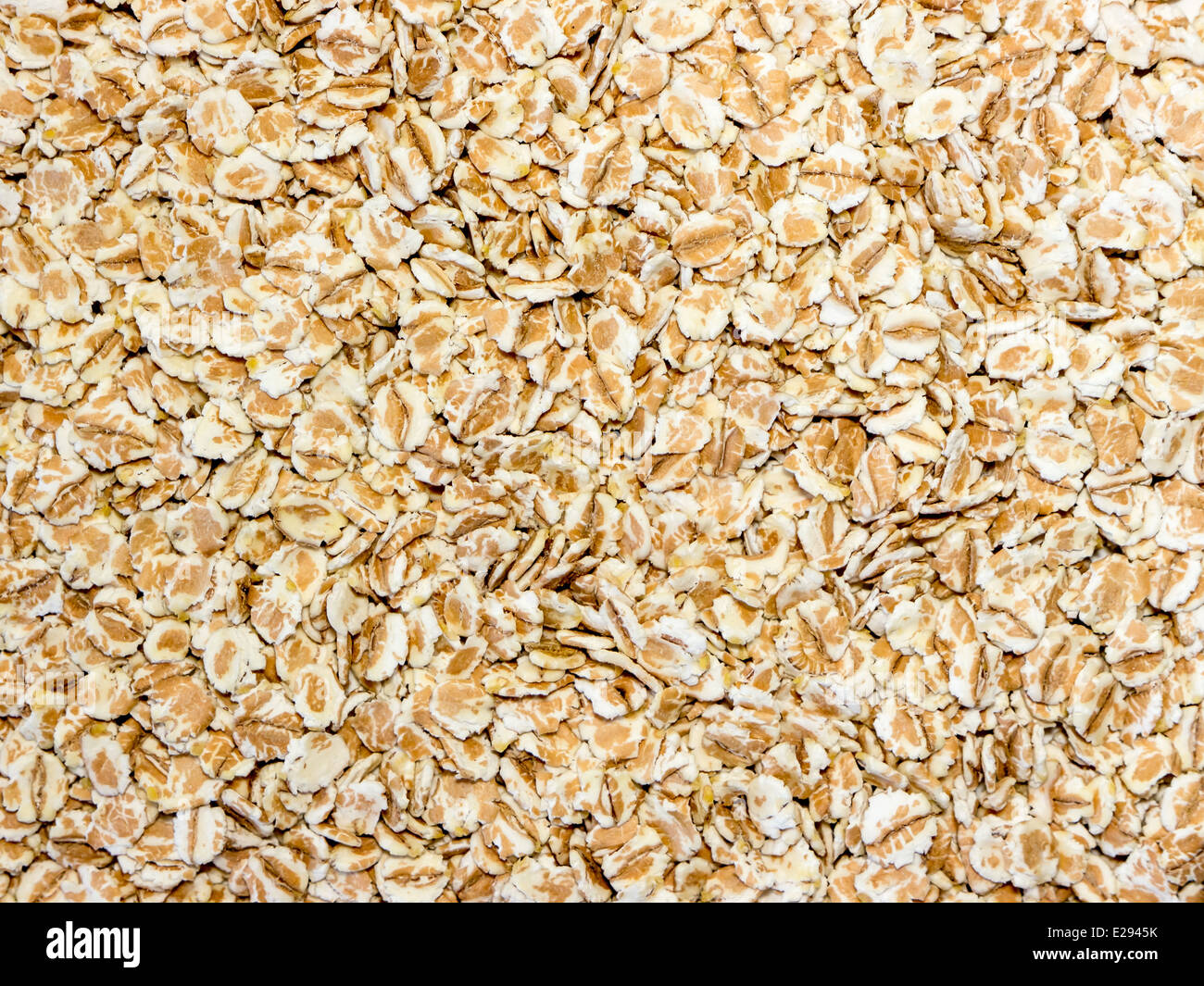 Wheat flakes background Stock Photo - Alamy