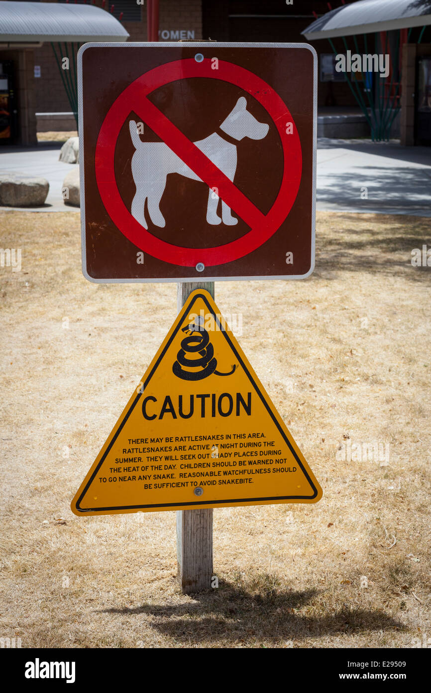 Warning sign in rest area to prevent dogs from snake bights, California ...