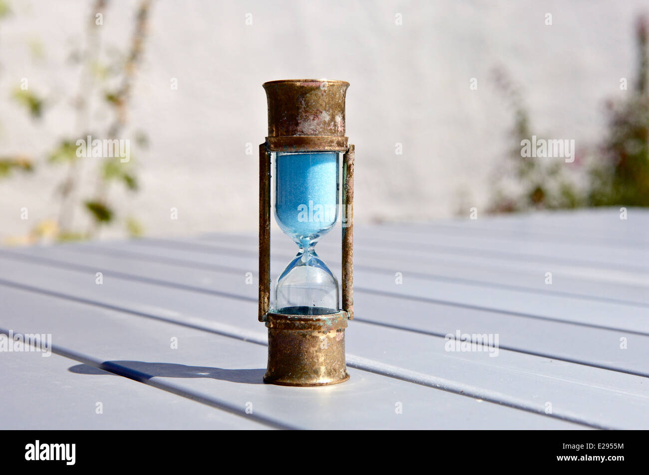 Sand Timer on table - Hourglass on table Stock Photo - Alamy
