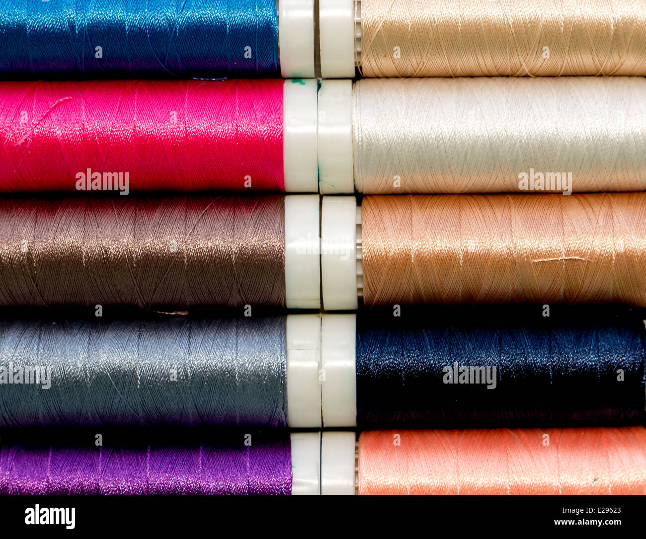 Colored spools of threads Stock Photo - Alamy