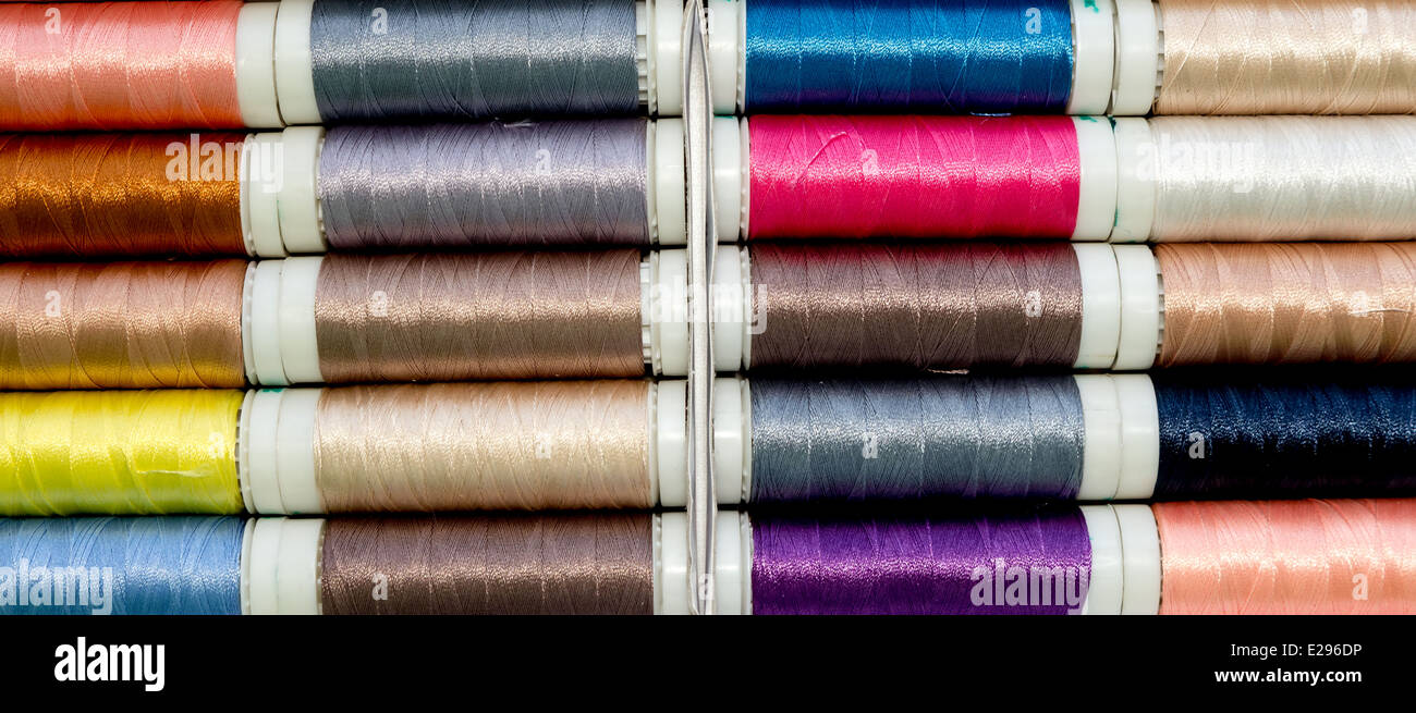 Colored spools of threads Stock Photo - Alamy