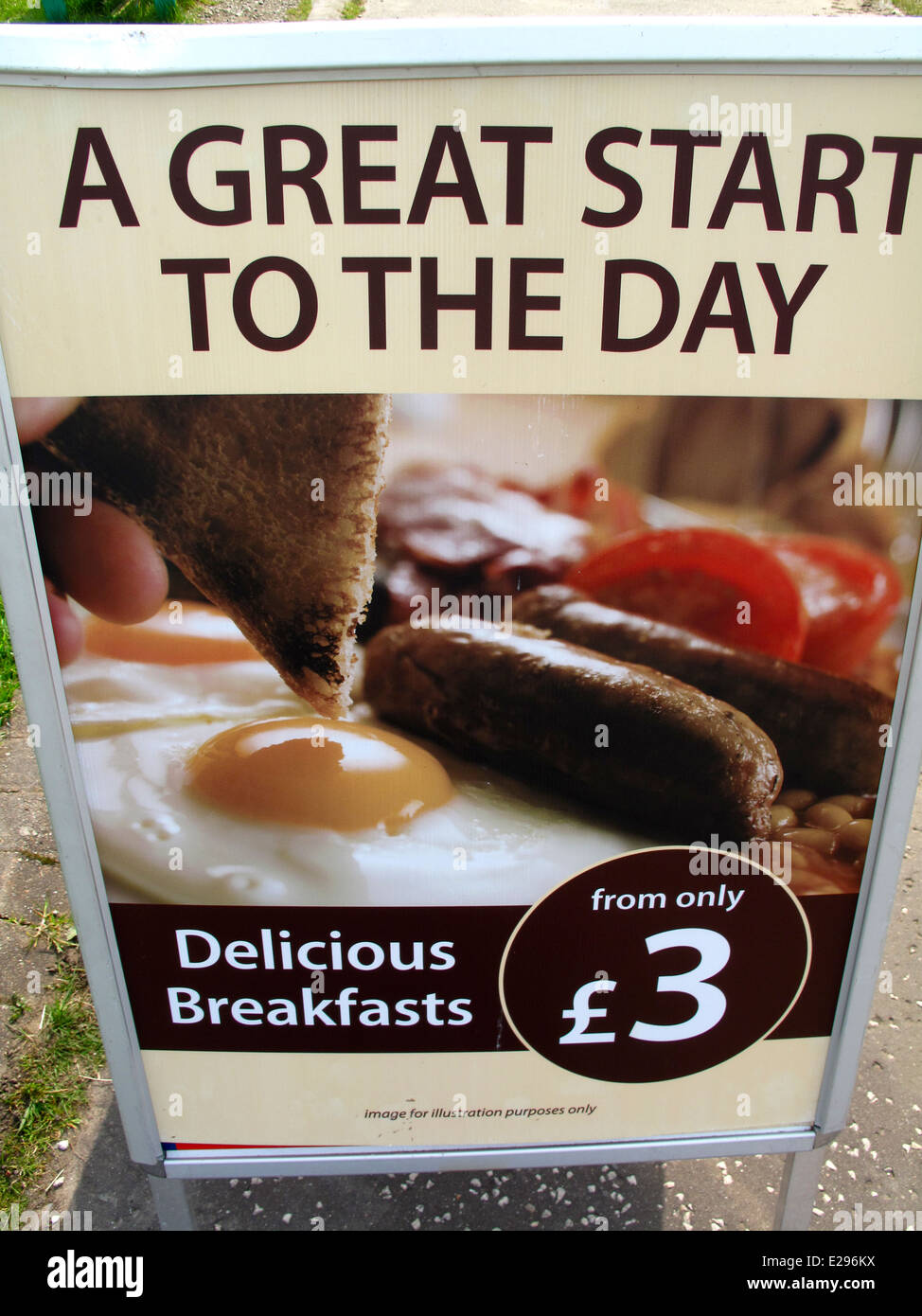 Advertising board outside restaurant promoting cooked breakfast from £3 ...