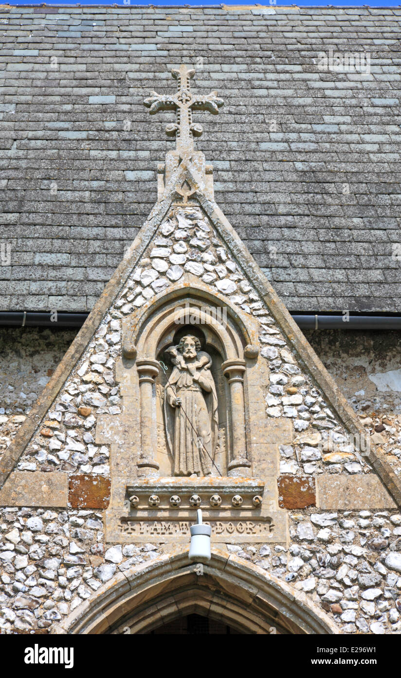 A view of a statue of Christ the Good Shepherd above the south porch of ...
