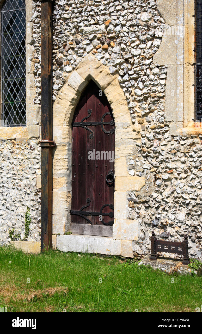 A Priest's door in the chancel of the parish church of St Andrew at ...