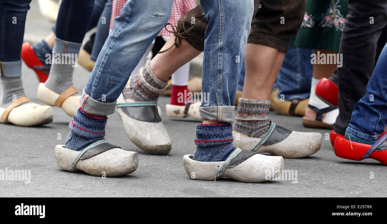 Neukirchen-Vluyn, Germany. 16th June, 2014. People walk in wooden clogs ...