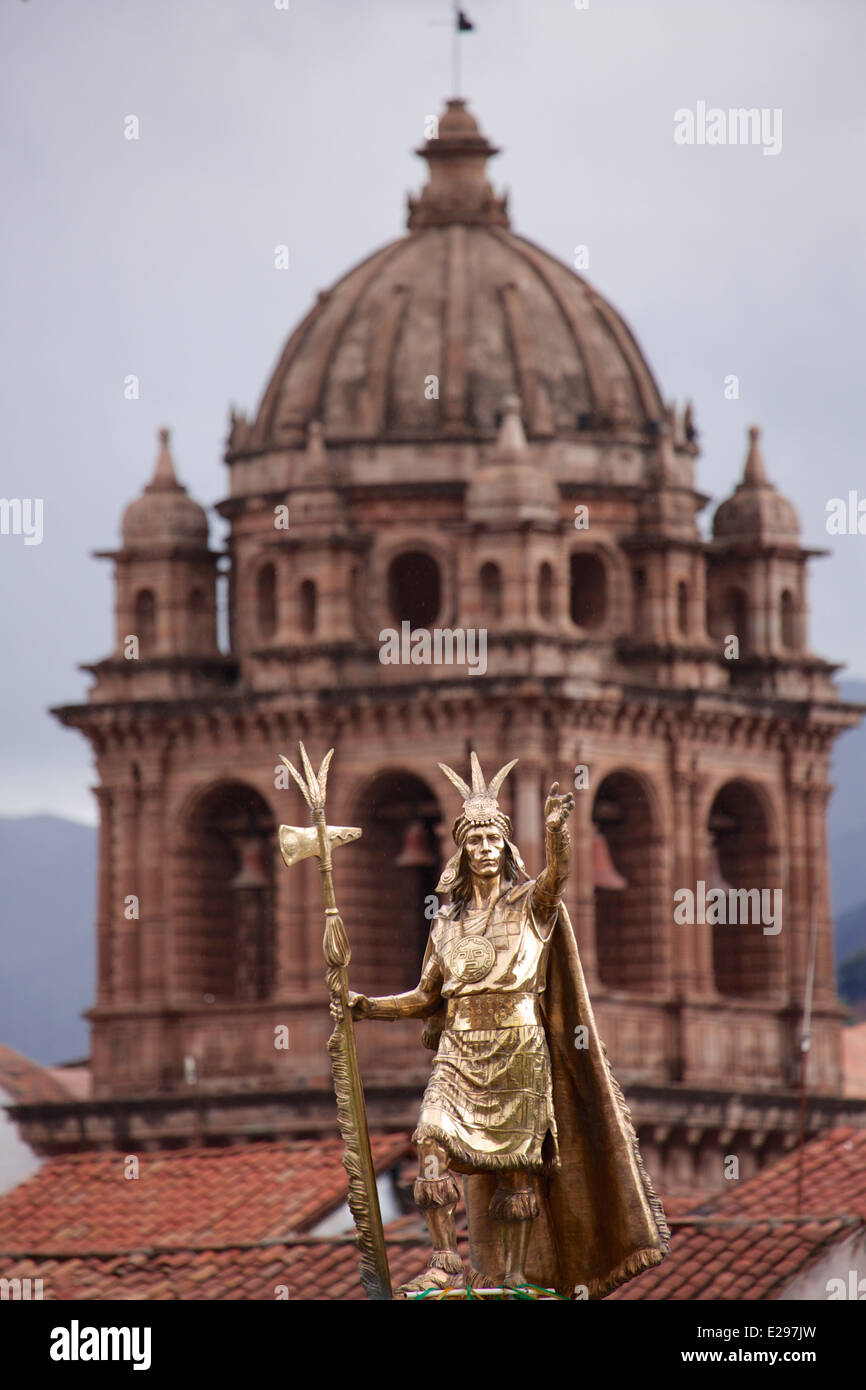 A golden statue in the Plaza de Armas in the center of Cusco, Peru, the ...