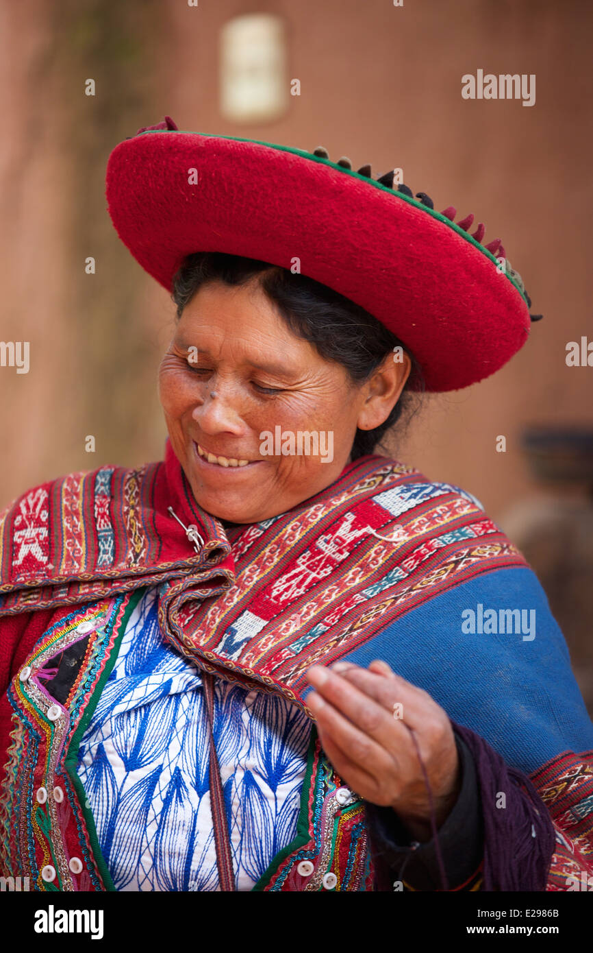 A portrait of a Quechua woman in traditional native dress in Chinchero ...