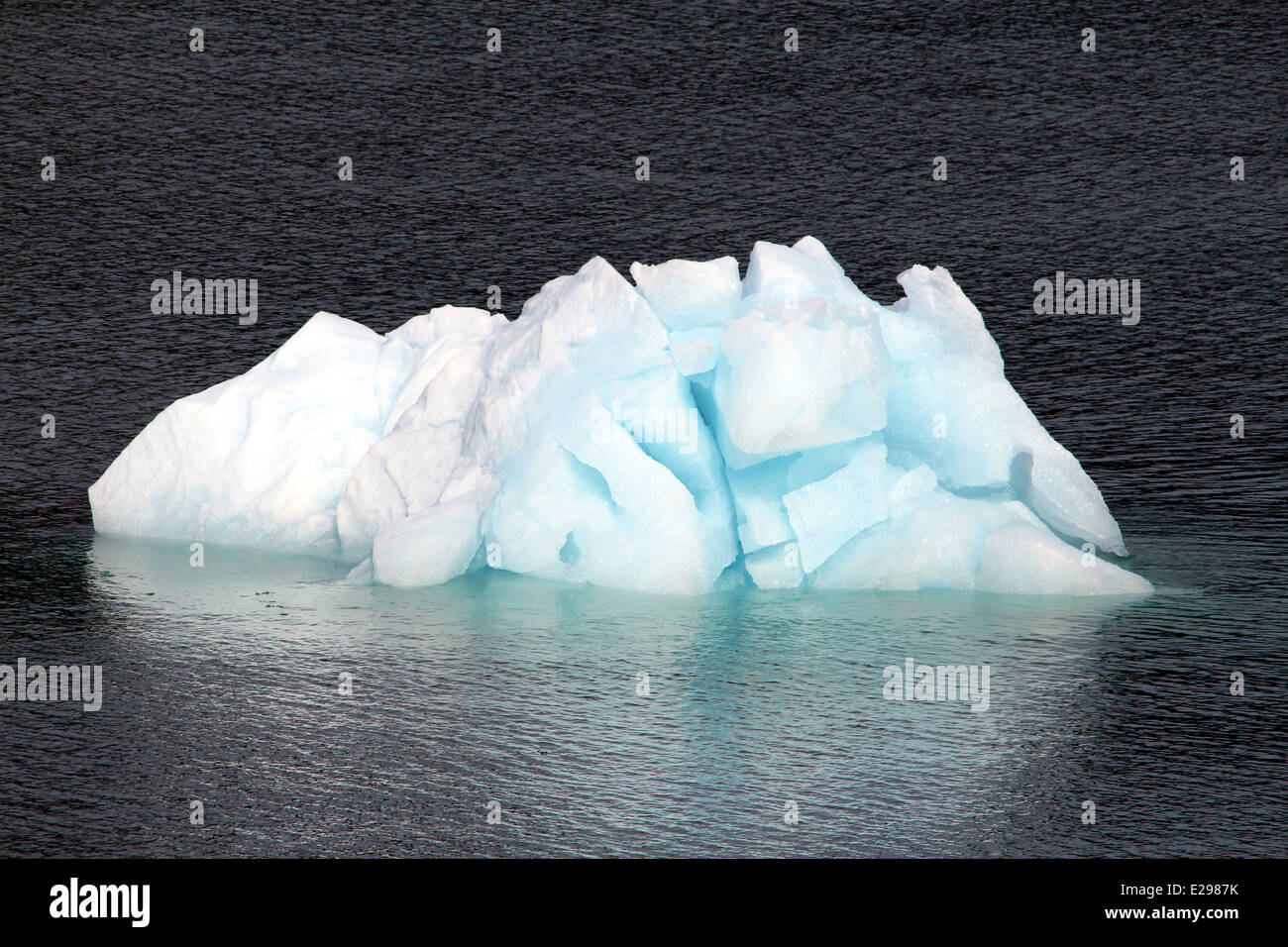 Beautiful Blue Iceberg floating in Alaska near Hubbard Glacier Stock ...