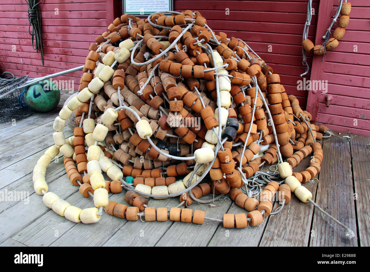 A big pile of fishing buoys at a Salmon factory in Alaska Stock Photo ...