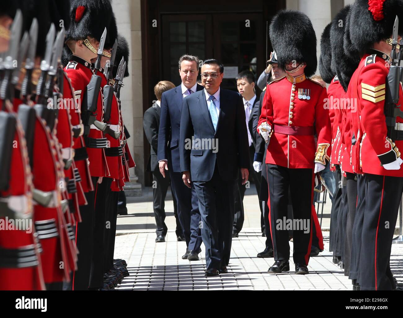 London, Britain. 17th June, 2014. Chinese Premier Li Keqiang (C ...