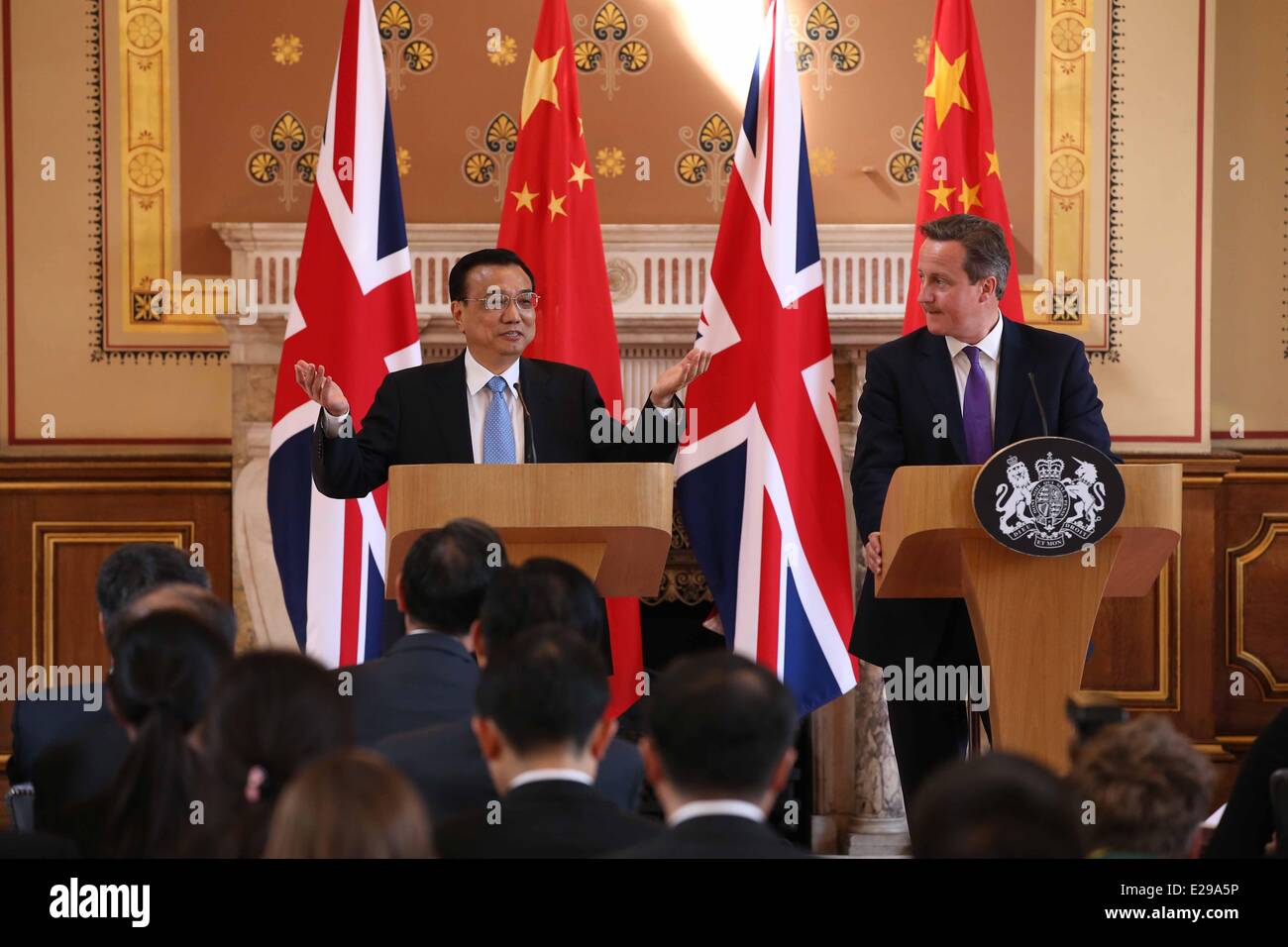 London, Britain. 17th June, 2014. Chinese Premier Li Keqiang (L) and ...
