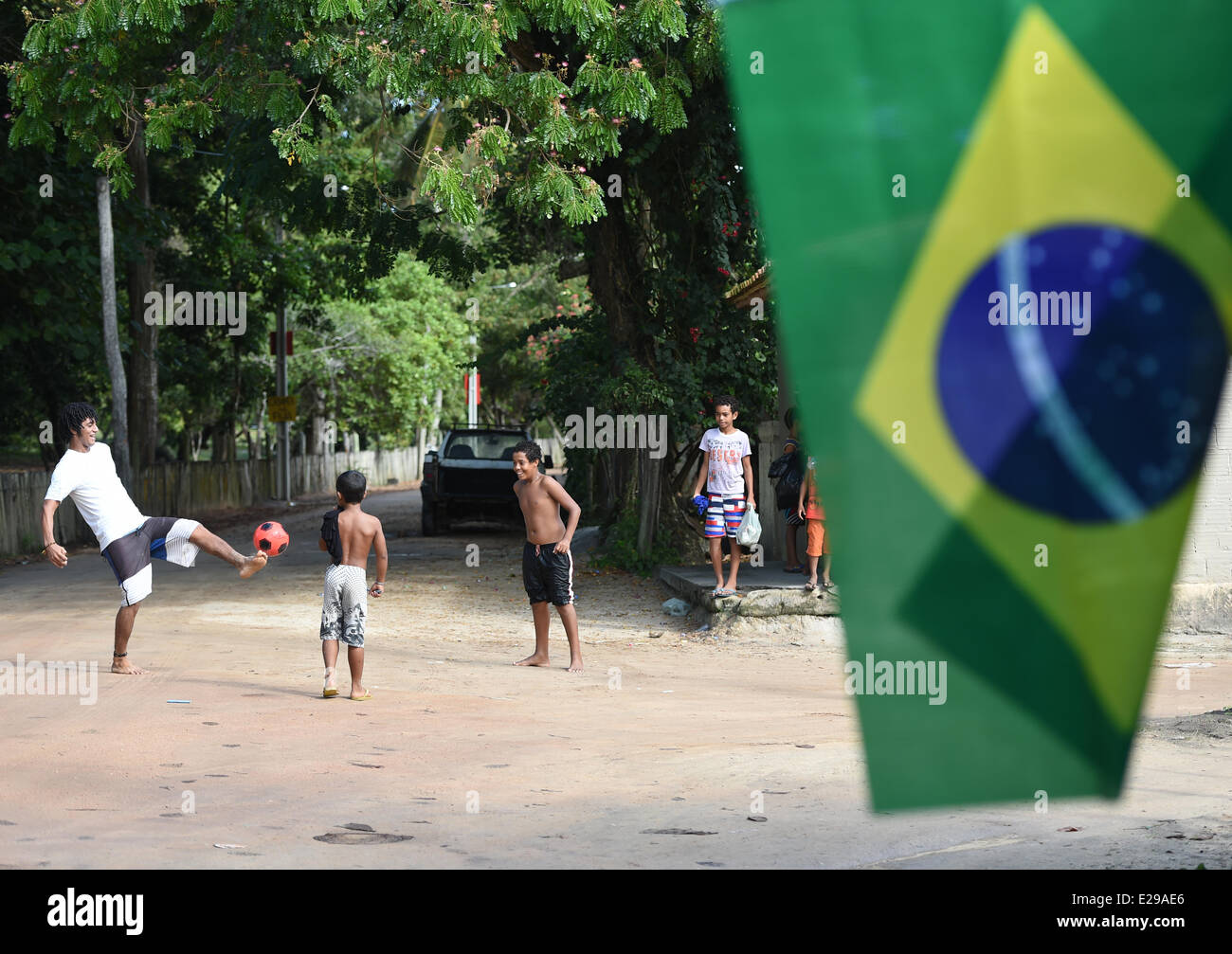 Santo Andre, Brazil. 17th June, 2014. Kids play football in a street in ...