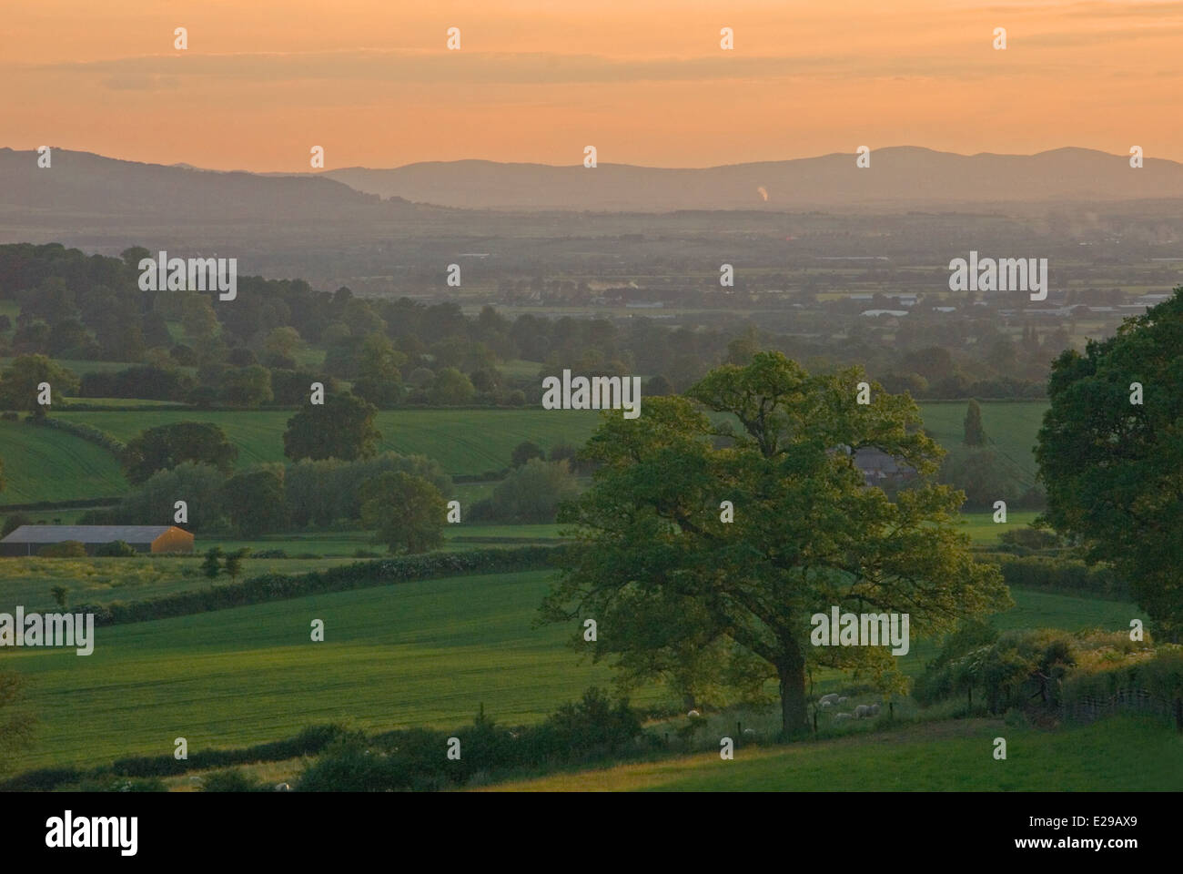 Sunset over the Cotswolds, with the view towards the Malverns Stock ...
