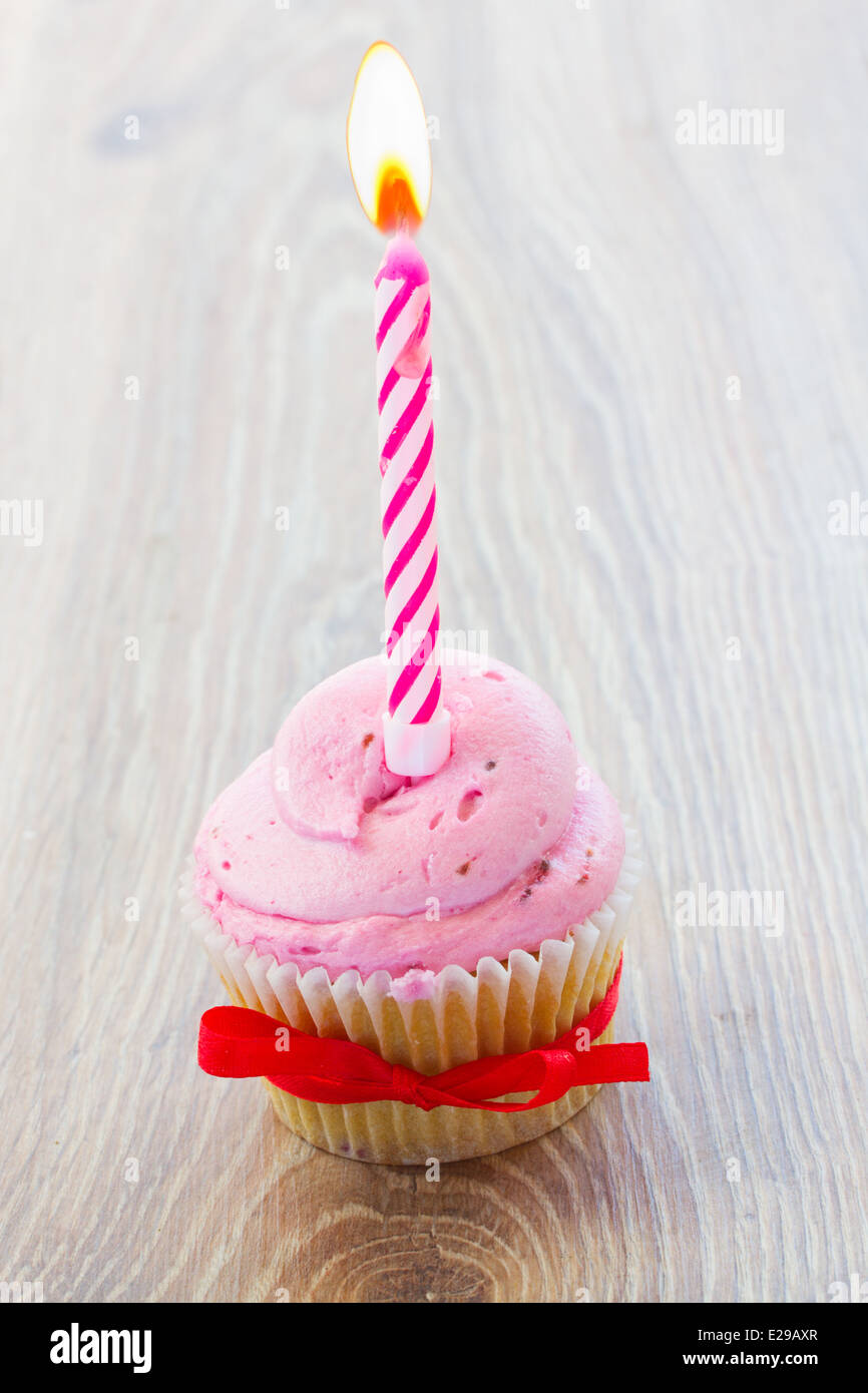 one birthday cupcake on table Stock Photo - Alamy