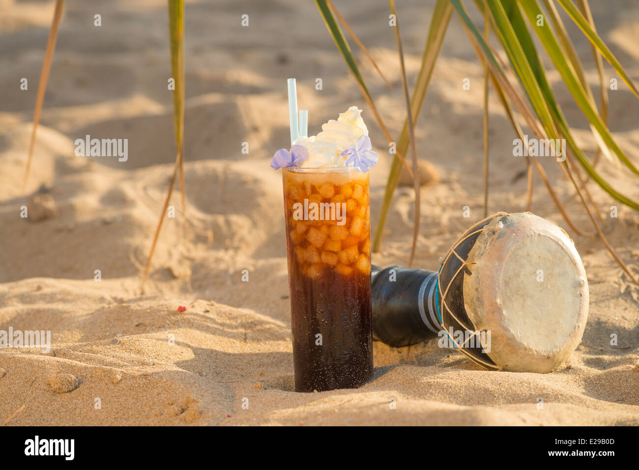 Coke cocktail still life on a sunny beach Stock Photo - Alamy
